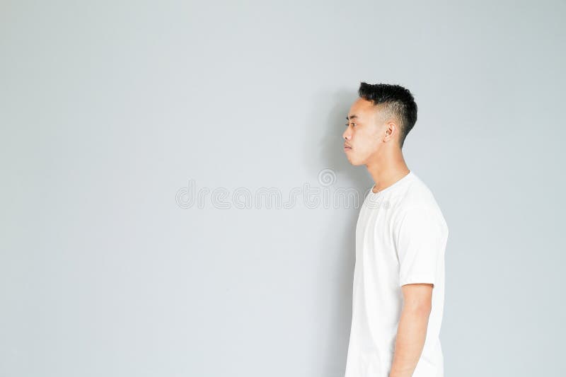 An Asian Youth is Facing To the Left Stock Photo - Image of pleased ...