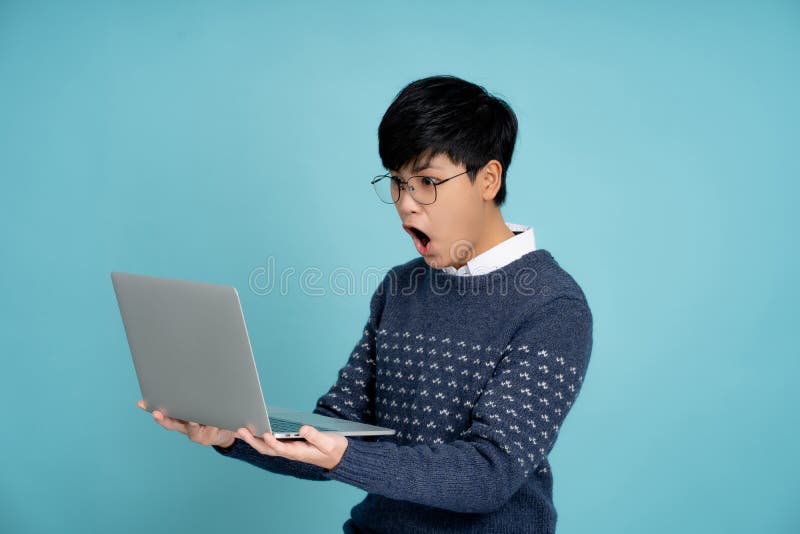 Asians Shocked and Holding Laptop Computer Stock Photo - Image of ...