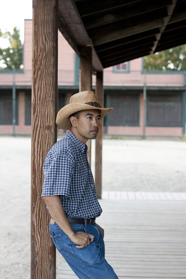 Asiatisk cowboy fotografering för bildbyråer. Bild av vinklad - 20898945