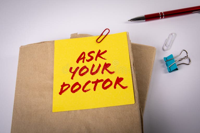 Ask Your Doctor. Yellow Sticky Note with Text on Book Stock Photo ...