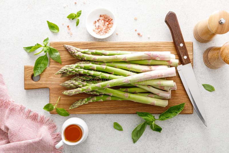 Asparagus. Cooking Bunch of Asparagus on Kitchen Table Stock Image ...