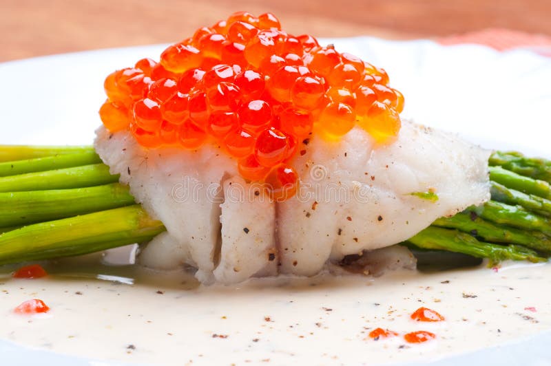 Asparagus with Fish and Red Caviar in Creamy Sauce Stock Image - Image ...