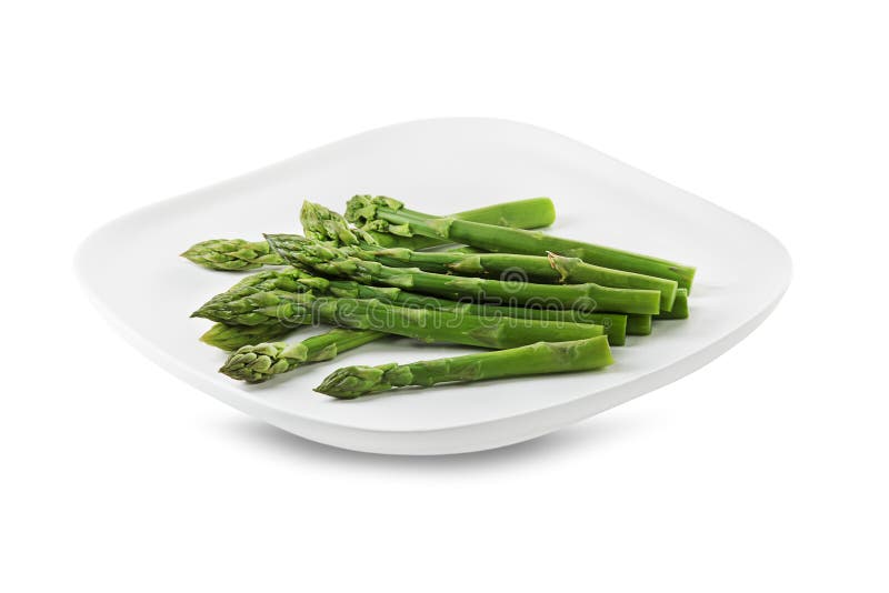 Cooked Asparagus in plate stock photo. Image of dish - 180756972