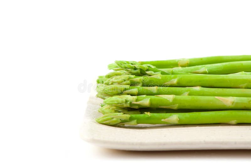 Asparagus on plate stock image. Image of vertical, wrapped - 11692229