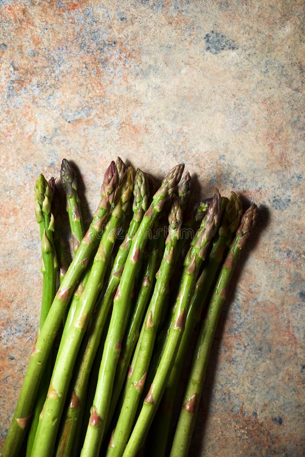 Asparagus on a table stock photo. Image of basic, green - 179622210