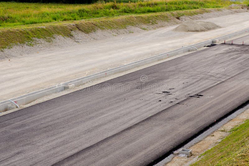 Asphalt and Asphalting the Road Stock Image - Image of pavement, hard ...