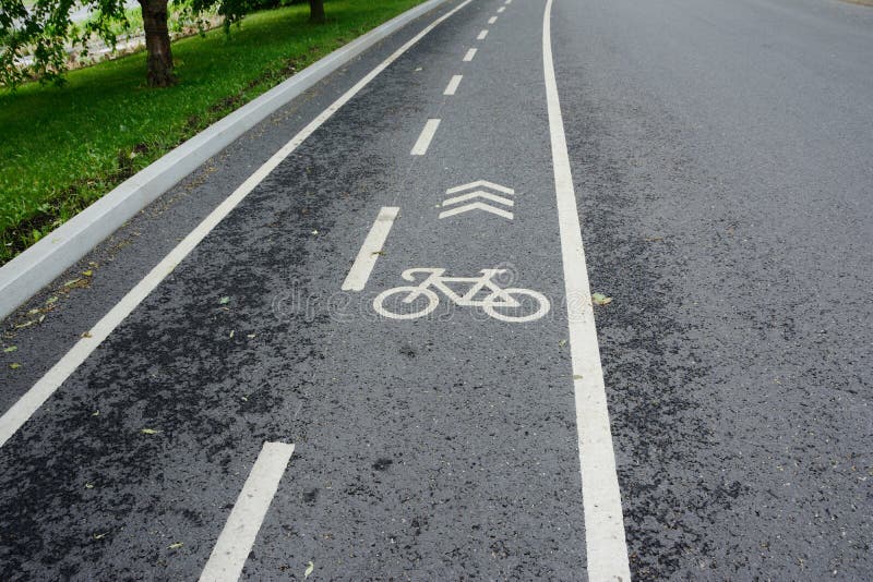 Asphalt Bicycle Track with a Bicycle Marking Stock Image - Image of ...