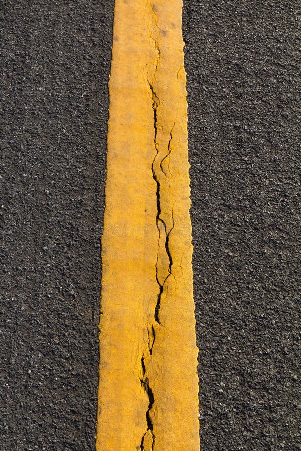 Asphalt broken yellow line stock image. Image of line - 53643309