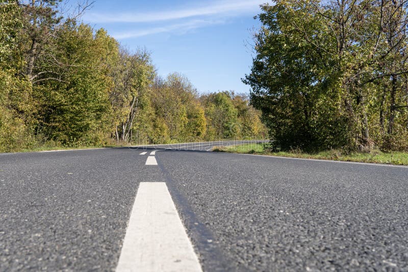 Asphalt Country Road Bend with Autumn Trees from Below Stock Photo ...