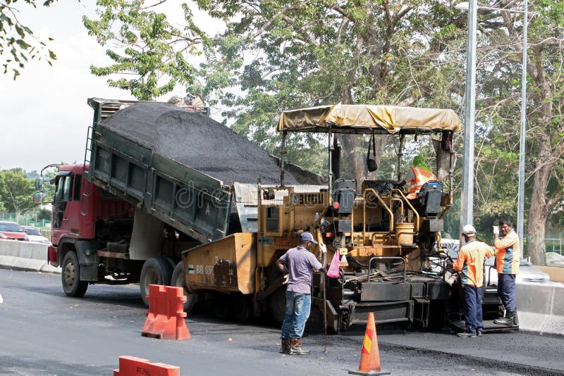 The Asphalt Machine Puts a New Layer on the Road. Editorial Photo ...
