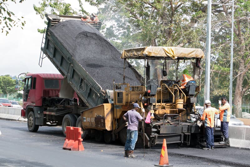 The Asphalt Machine Puts a New Layer on the Road. Editorial Photo ...