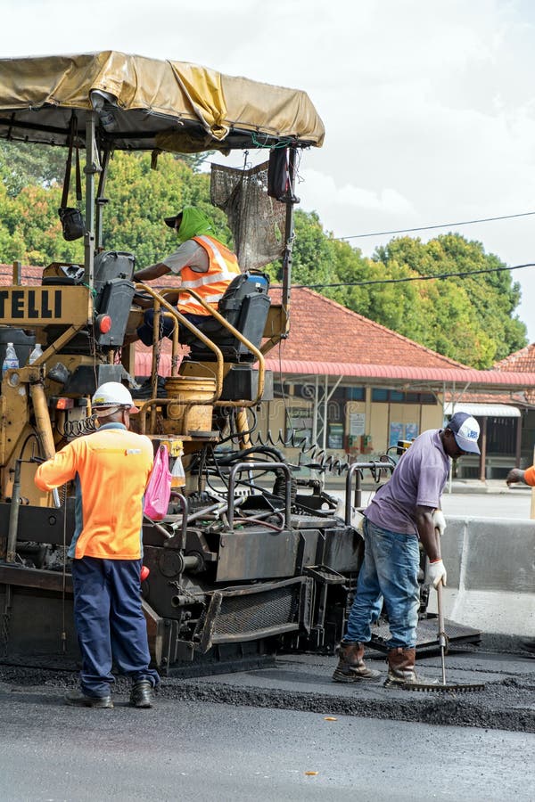 The Asphalt Machine Puts a New Layer on the Road. Editorial Photo ...