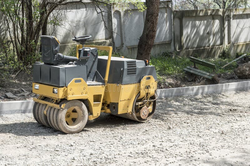 Asphalt Machine that is on the Road and is Ready To Work Stock Photo ...