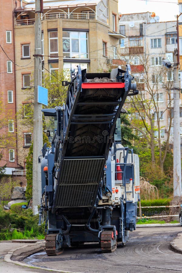 Asphalt Milling and Grinding Machine at Road Repair Site Stock Photo ...