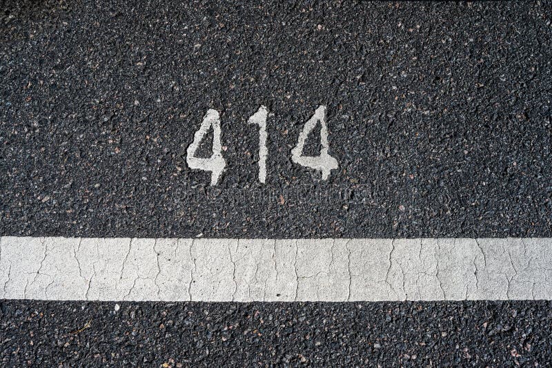 Asphalt with Number 414 in White Paint.. Stock Image - Image of ...