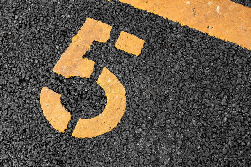 Asphalt Parking Lot with Yellow Lot Line and Yellow Lot Number 5, Five ...