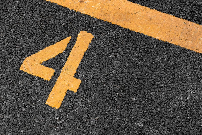 Asphalt Parking Lot with Yellow Lot Line and Yellow Lot Number 7, Seven ...