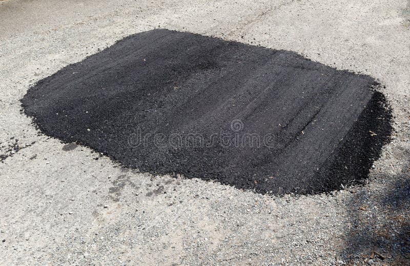 Asphalt patch repair stock image. Image of transportation - 192468393