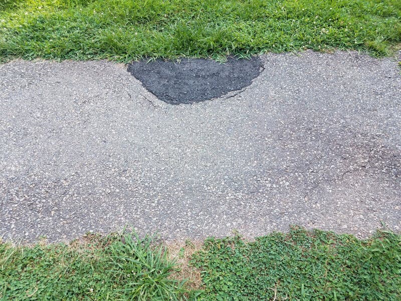 Asphalt Path with Damaged and Fixed Section and Grass Stock Photo ...