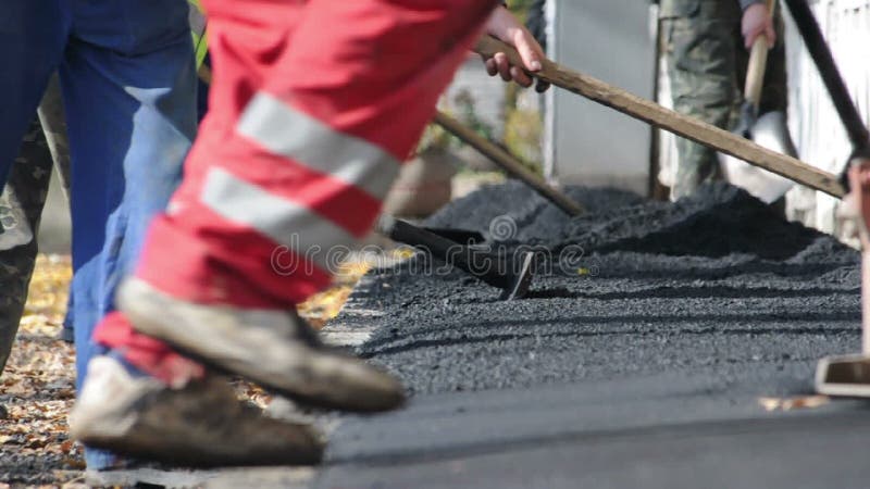 Asphalt Paver or Asphalt Paver on a Construction Site. Road Repair in ...