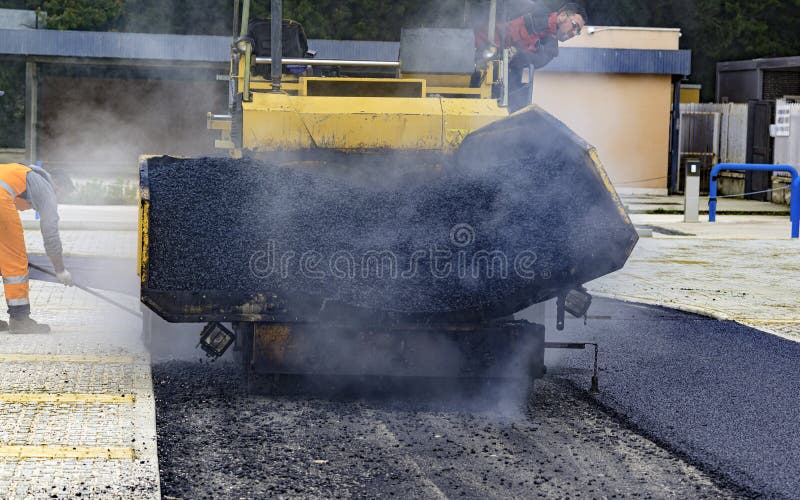 Asphalt Paver with Asphalt Heated To Temperatures Above 160 Â° during ...