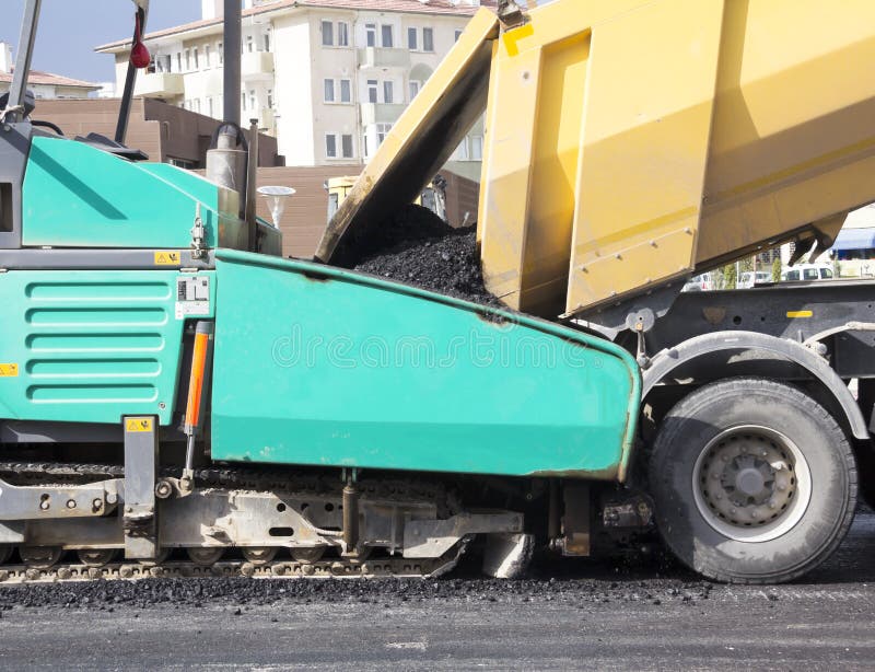 Paver Machine on a New Asphalt Road Surface. Laying of a New Asphalt ...