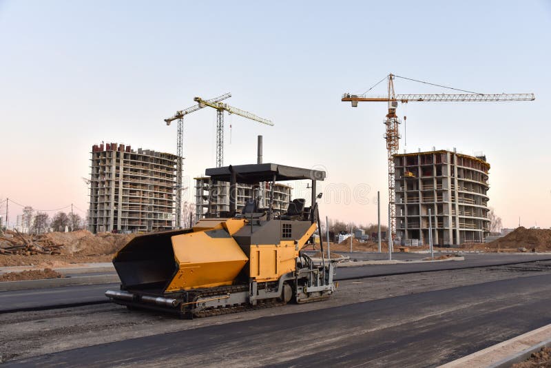 Asphalt Paver Machine during Road Work. Road Machinery at Construction ...