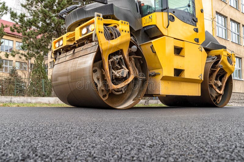 Asphalt Paver Machine Working on the New Road Stock Image - Image of ...