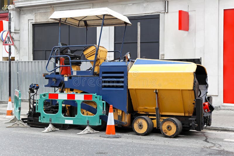 Asphalt paving machine stock photo. Image of machinery - 27081394