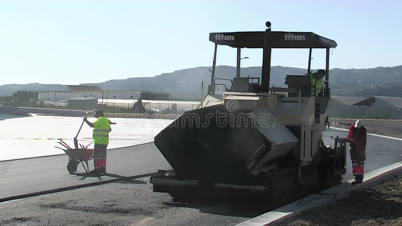 Paving Machine Tarring a New Road Stock Footage - Video of environment ...