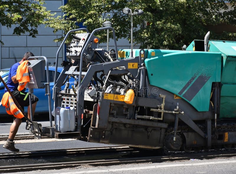 Asphalt Paving Machinery at Work Editorial Stock Image - Image of ...