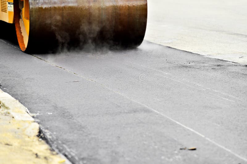 Asphalt Paving with a Steel Wheel Roller Stock Image - Image of ...