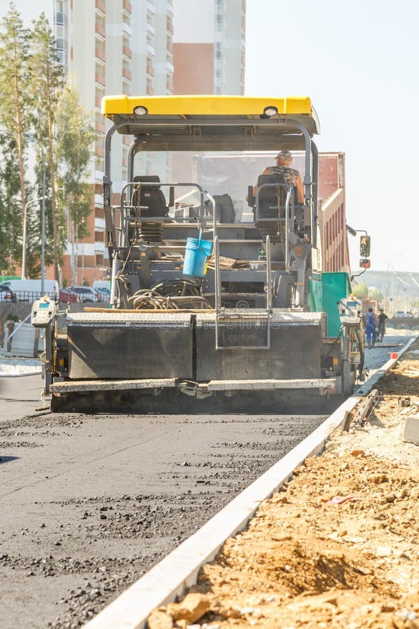 Asphalt-placing machine stock image. Image of machine - 87273155