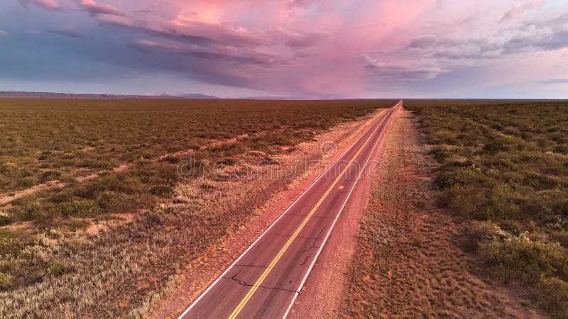 Asphalt Road Across the Desert at Dawn. Aerial View Stock Photo - Image ...