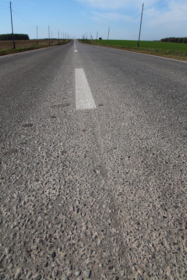 Asphalt road and blue sky stock photo. Image of direction - 26817932