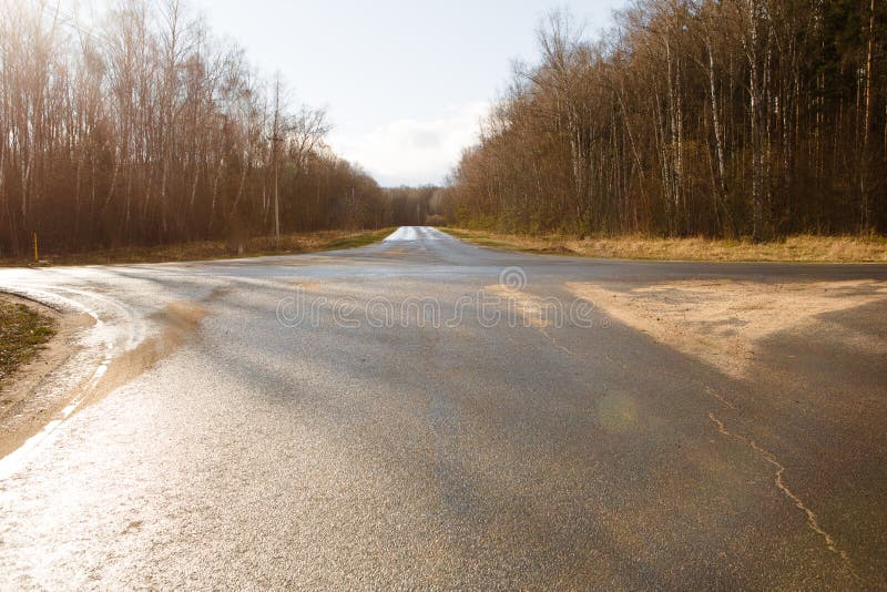 The Asphalt Road Branches Off in Three Directions. Stock Image - Image ...