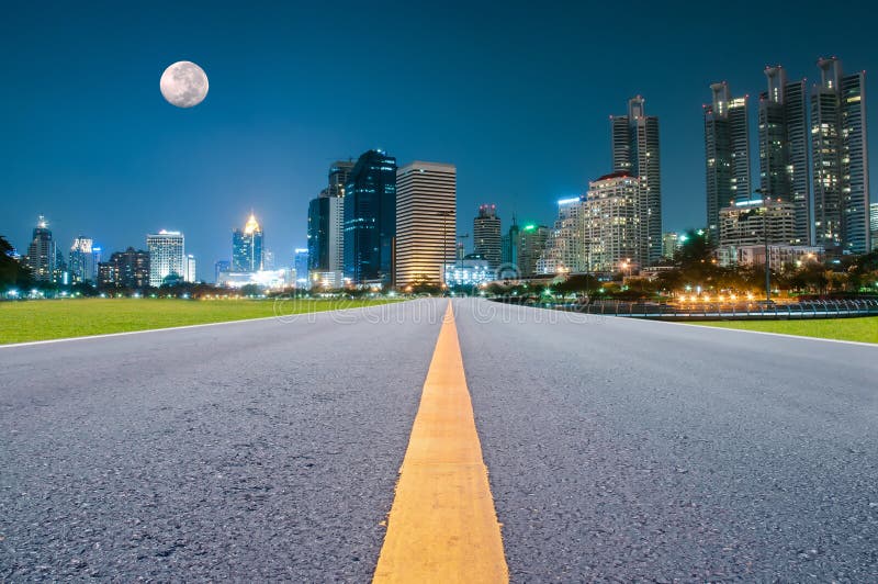 Asphalt road and a city stock image. Image of center - 35761437