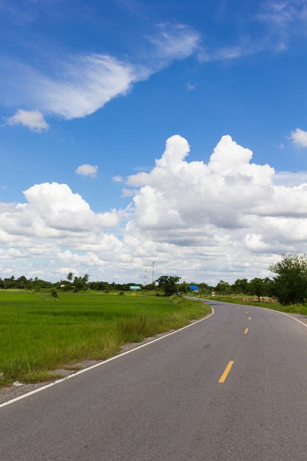 Asphalt Road and Clouds on Blue Sky Stock Image - Image of rural, grass ...