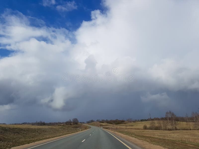 Road and clouds on sky stock image. Image of freeway - 108772671