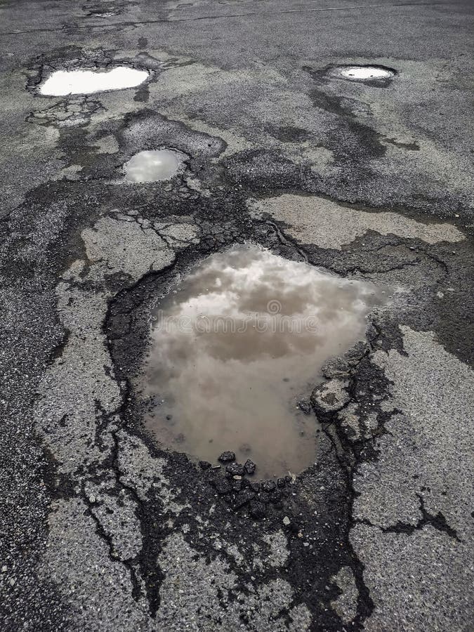 The Asphalt Road Condition is Pothole Stock Photo - Image of weathered ...
