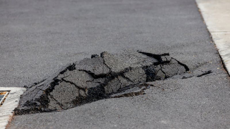 Asphalt Road Damaged. Cracked Road after Earthquake. Poor Asphalt ...