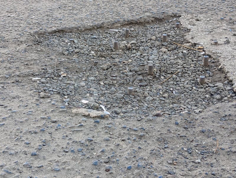 The Asphalt Road is Damaged, Showing the Edge of the Iron Stock Image ...