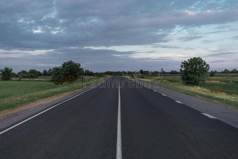Asphalt Road Going into the Distance on a Summer Evening Stock Image ...