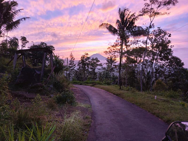 Asphalt Road in a Hilly Area in the Afternoon Stock Photo - Image of ...