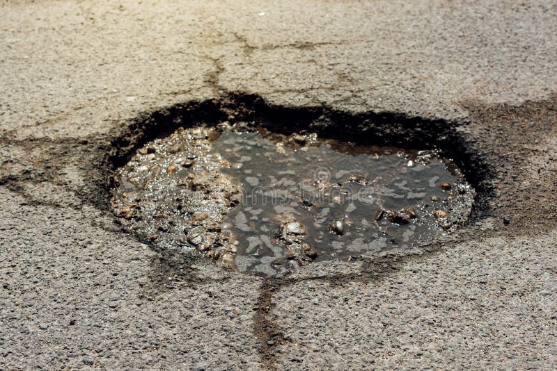 Asphalt road hole damage stock photo. Image of chunks - 91530114
