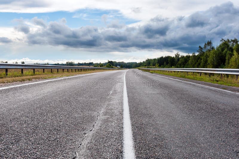Asphalt Road Low Point View in Cloudy Day Stock Photo - Image of drive ...