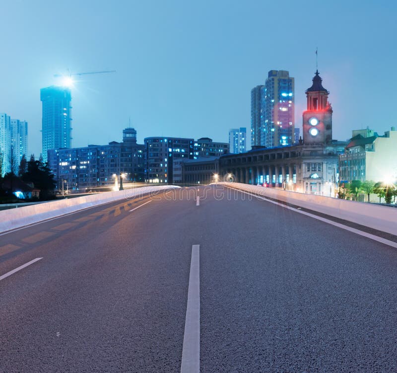 Asphalt Road and Modern City Stock Image - Image of famous, dusk: 287007285