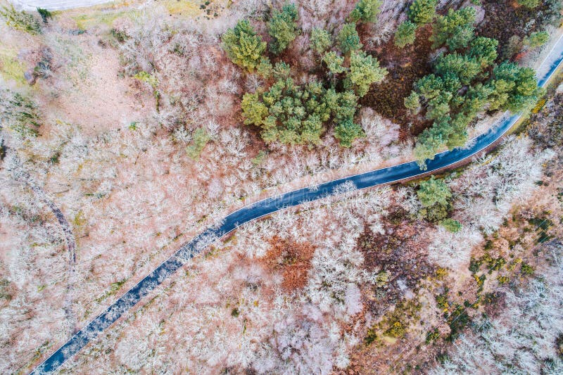 Asphalt Road on a Mountain in Winter, Zenithal View with Drone Stock ...