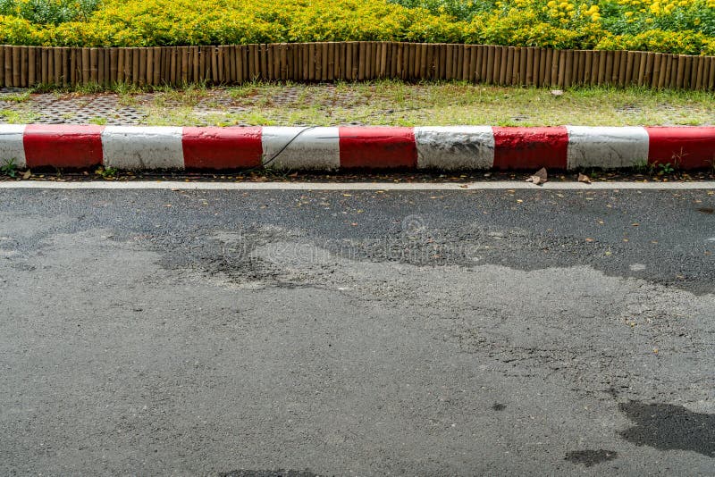 Concrete Road with Red and White Stock Image - Image of outdoor, path ...