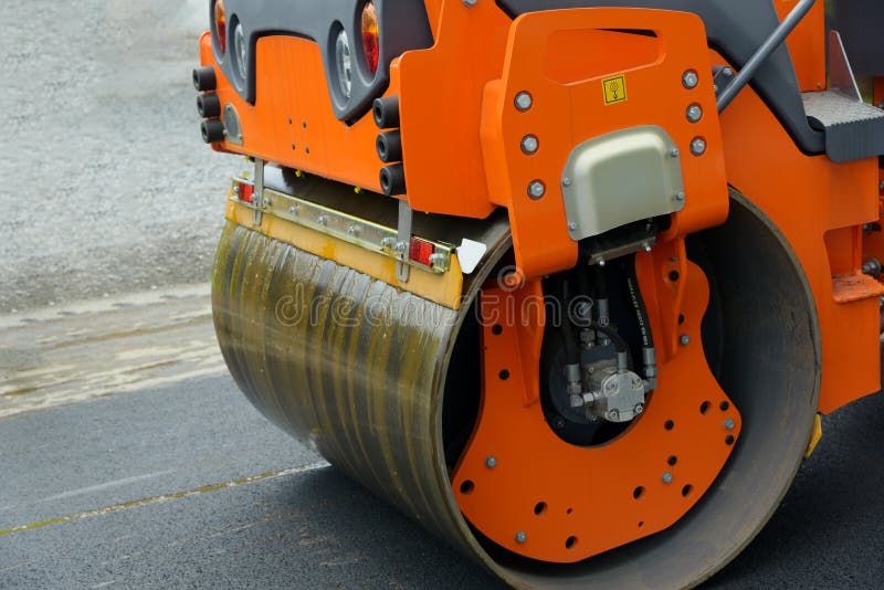 Asphalt Road Roller with Heavy Duty Rollers at Construction Site. Stock ...